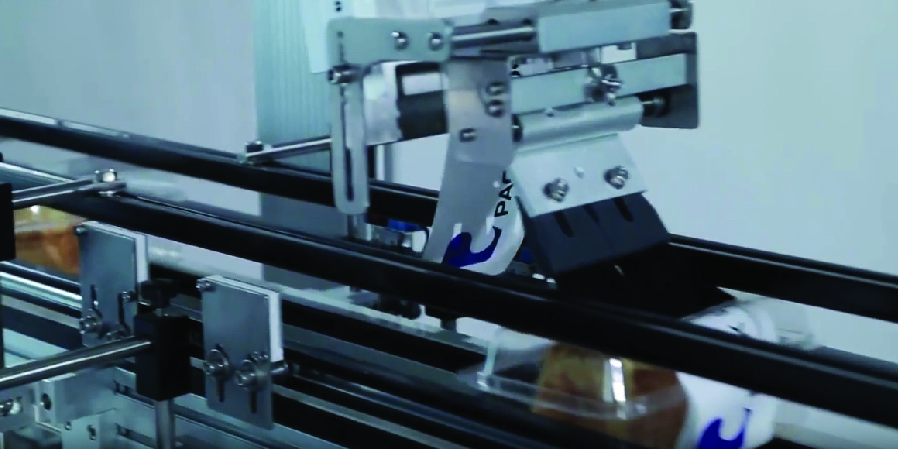 Top and Bottom Labeling Machines for the Fresh Food Industry
